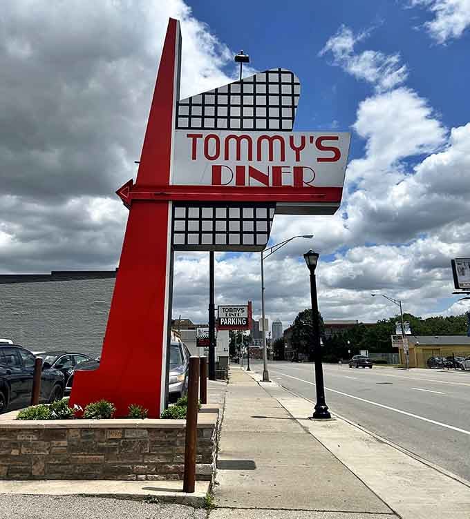 That retro arrow sign pointing the way to Tommy's is like a beacon calling all breakfast lovers home.
