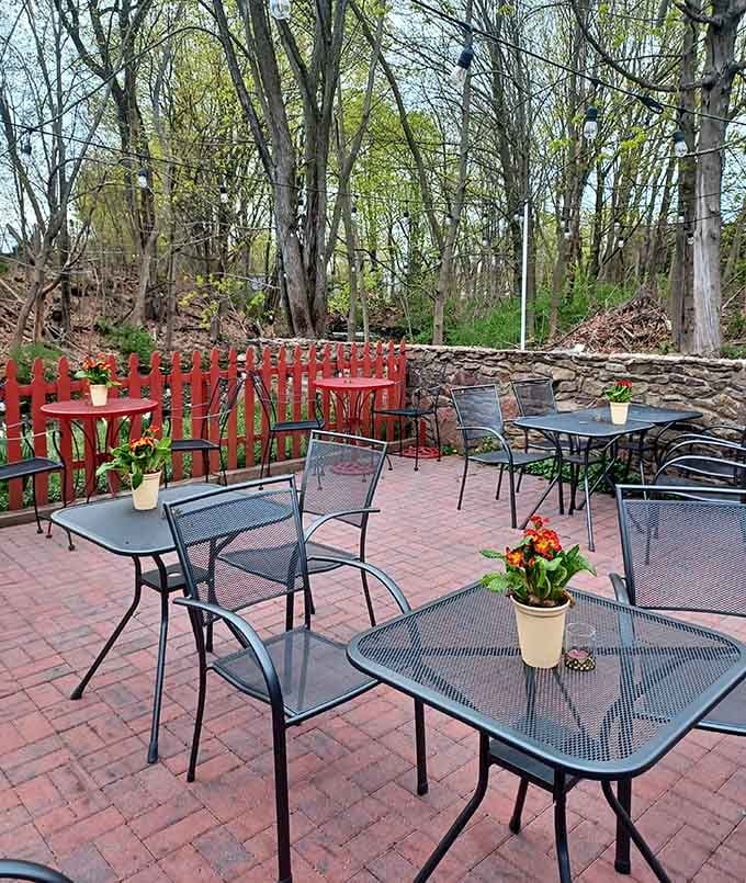 The outdoor patio offers fresh air dining surrounded by Connecticut woods, perfect for warmer evenings and good conversation.