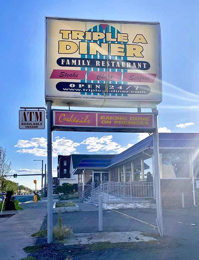 That towering sign promises steaks, chops, and seafood around the clock, because hunger doesn't punch a time card.