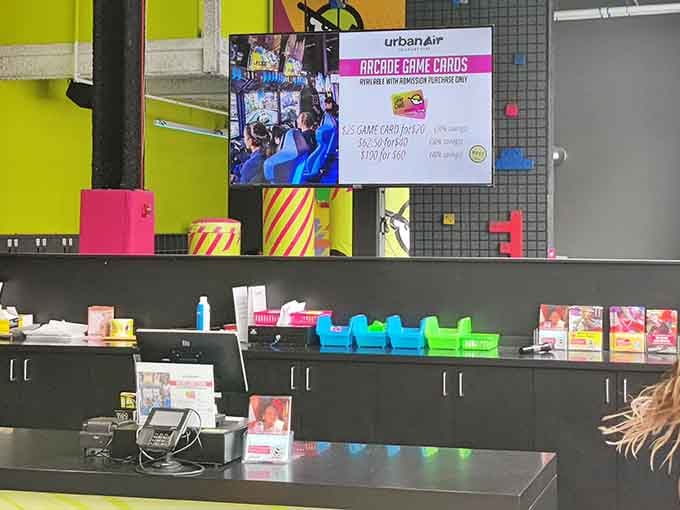 The check-in counter where your ordinary day officially ends and your inner seven-year-old takes over the steering wheel.