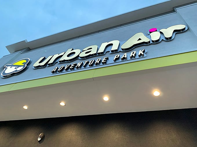 Urban Air's welcoming sign, beckoning you to rediscover muscles you forgot existed until tomorrow morning.