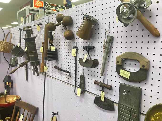 Vintage tools hanging like an industrial art installation, perfect for the DIY enthusiast or nostalgic decorator's wall.