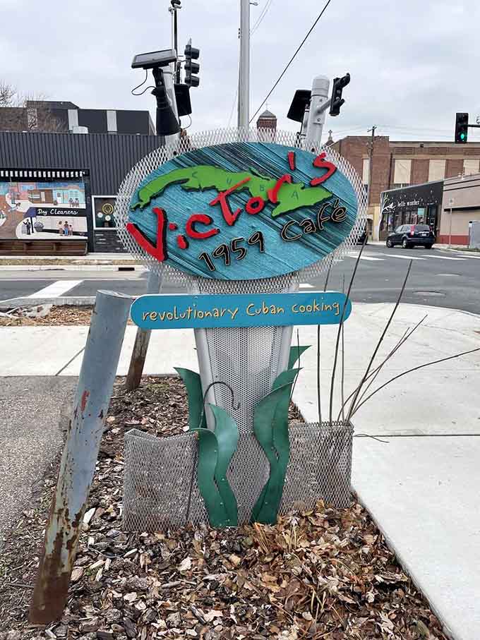 That retro sign promises revolutionary Cuban cooking, and trust me, it delivers on every single word of that promise.