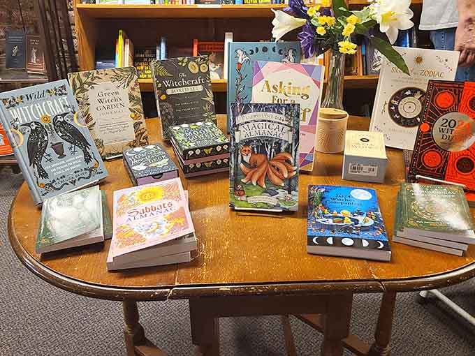 Village Books and Paper Dreams witchcraft and magic books displayed on a round table for curious minds seeking mystical reads.