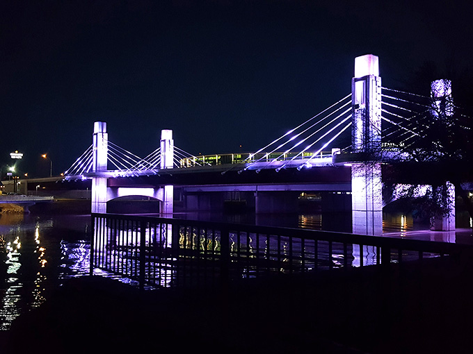 The Riverwalk transforms into something magical after dark, like Cinderella but with better lighting.
