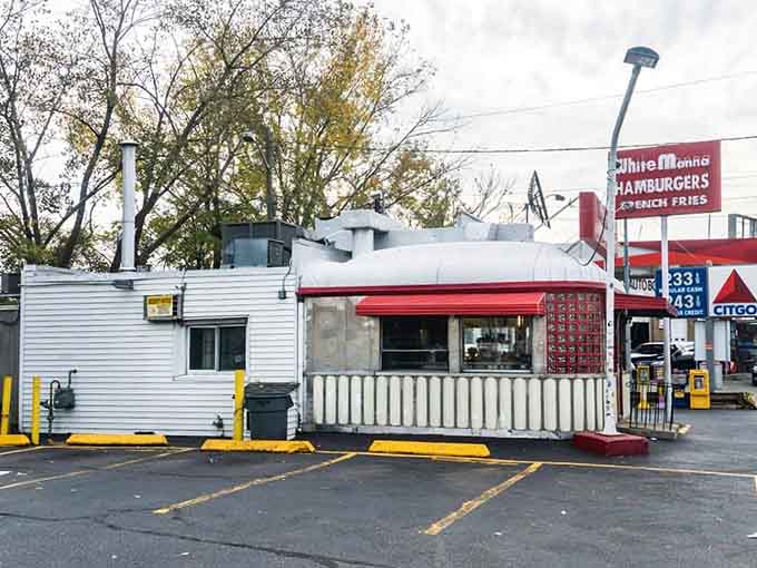 The humble parking lot outside this tiny building has witnessed more burger pilgrimages than most tourist attractions ever will.