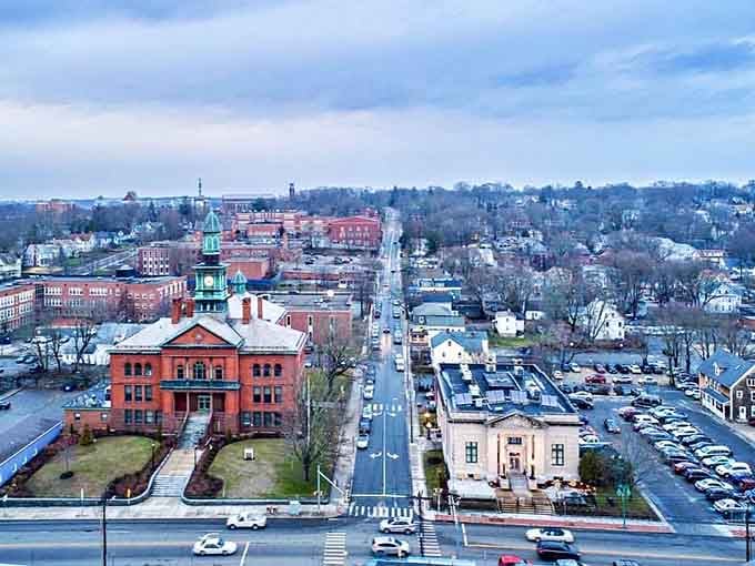 The aerial view reveals Willimantic's compact charm, where everything you need sits within walking distance of affordable rent.