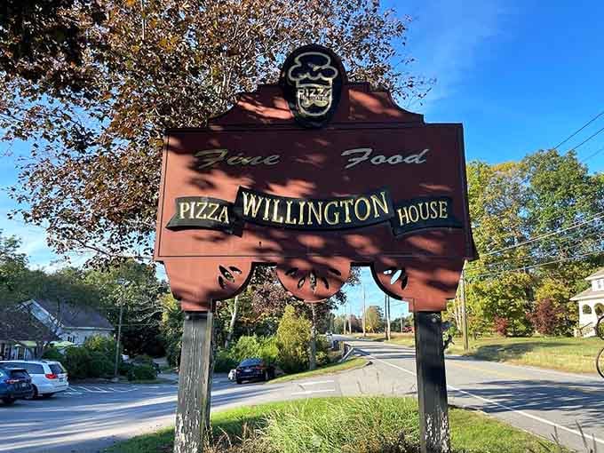 The classic roadside sign welcomes travelers to discover why Willington Pizza House earned its legendary status among pizza lovers.