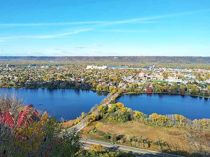 Autumn paints the valley in gold and crimson while the lake mirrors the sky in this view worth every step uphill.