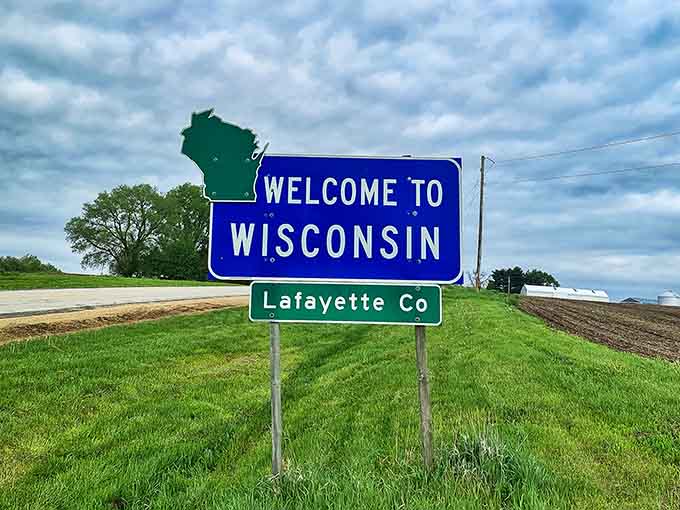 Lafayette County's spring greeting, where farmland meets that beautiful blue sign we all know and love.
