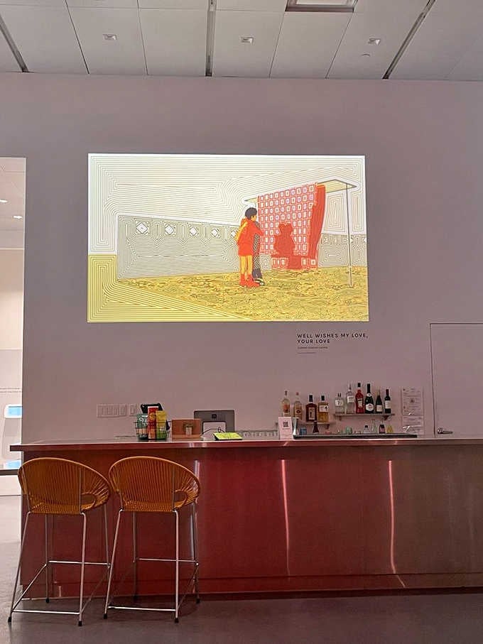 Even the bar area gets artistic treatment, because apparently refreshments taste better surrounded by contemporary masterpieces.