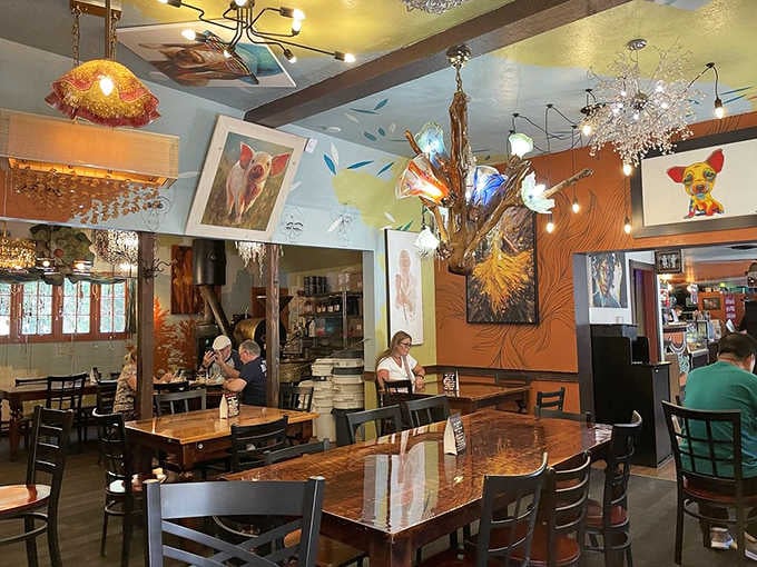 Eclectic artwork and polished wood tables create the perfect backdrop for serious eating and people watching fun.
