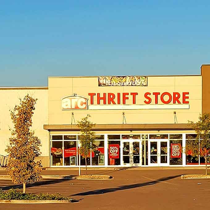 The building glows golden in the evening light, beckoning bargain hunters to come discover their treasures.