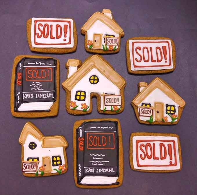 Custom cookies celebrating life's milestones—these "SOLD" house cookies are almost too perfect to eat, but you will anyway.