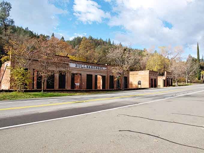 These historic brick structures line the quiet street where Gold Rush dreams once flourished before the railroad changed everything forever.