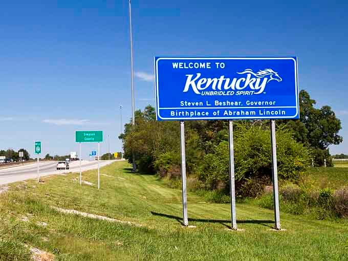 Bright sunshine illuminates this interstate greeting, promising bourbon trails, horse farms, and fried chicken just ahead.