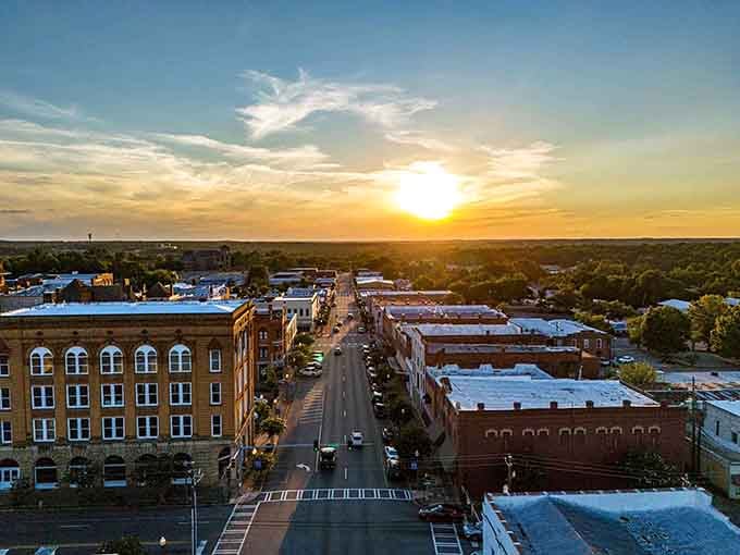 Golden hour transforms this historic downtown into pure magic, where brick buildings glow like they're showing off.