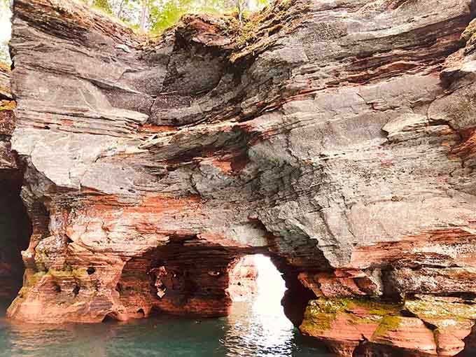 Lake Superior carved this sandstone masterpiece like a patient sculptor working for thousands of years.