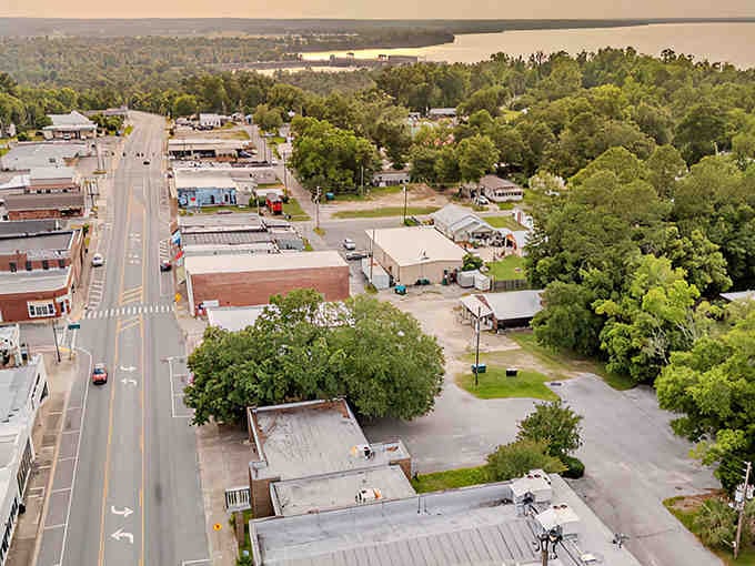 From above, this riverside town looks like a postcard from a simpler time when neighbors knew each other.