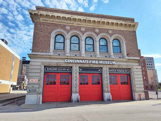 Those bright red doors against classic brick architecture make this historic firehouse look ready to spring into action today.