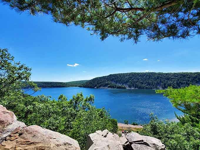 That sapphire-blue water framed by ancient bluffs looks like nature's own postcard come to life.