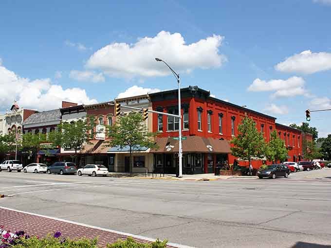 That bold red brick building catches your eye like a beacon, inviting you to explore downtown's treasures.