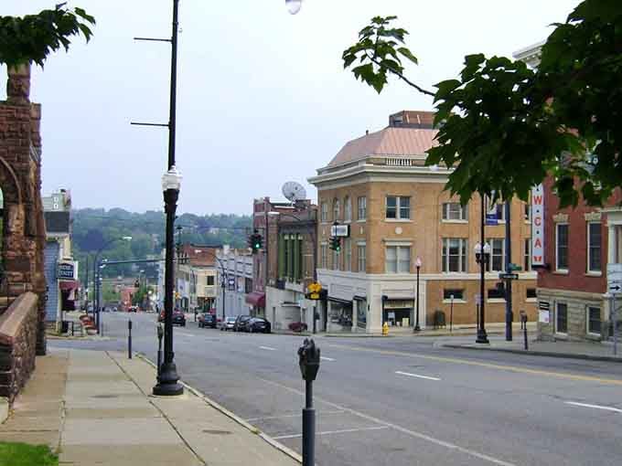 Classic downtown streets slope gently toward the horizon, where historic buildings meet rolling hills in perfect harmony.