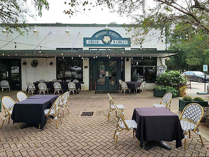 Those bistro chairs and string lights transform a simple patio into a charming European-style dining escape.