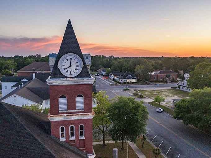 That clock tower glowing against a peach-colored sunset is like something from a Norman Rockwell painting come to life.