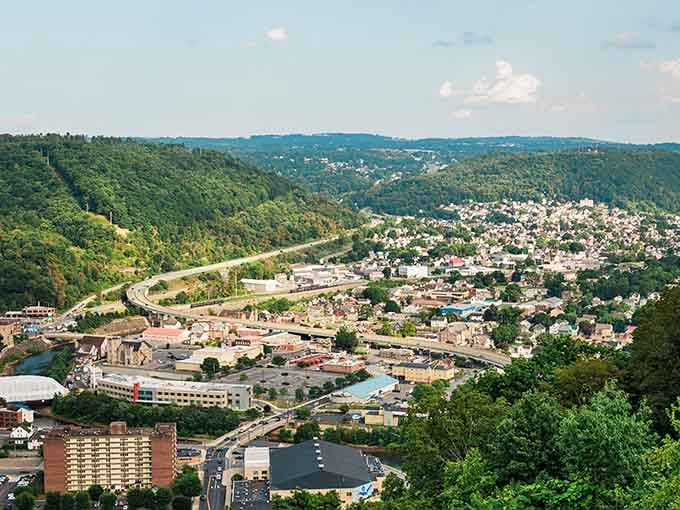 Mountains cradle this valley city where green hillsides meet affordable living and genuine community spirit thrives daily.
