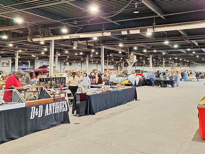 This sprawling indoor marketplace stretches endlessly, where treasure hunters roam aisles discovering yesterday's memories and tomorrow's perfect finds.