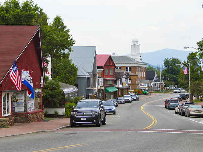 Mountain peaks frame this Olympic village where the air tastes crisp and your worries disappear faster than snow in July.