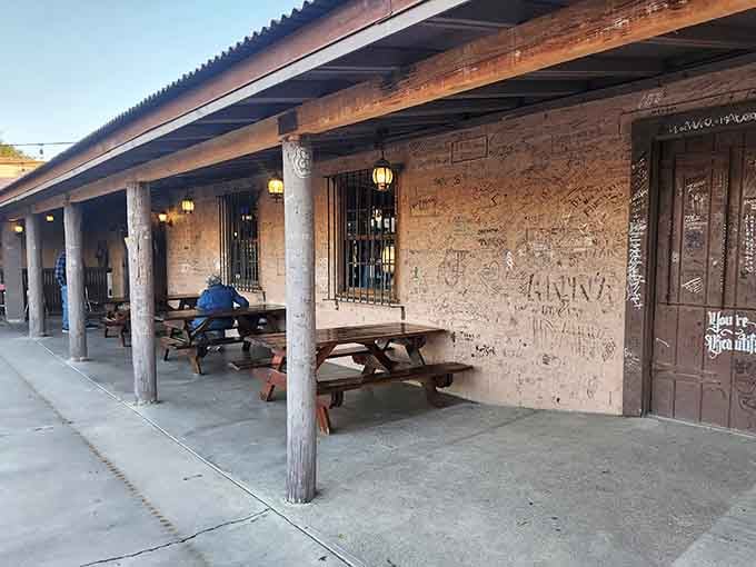 Sometimes the best steakhouses hide behind weathered adobe walls and picnic tables that have seen countless family gatherings.
