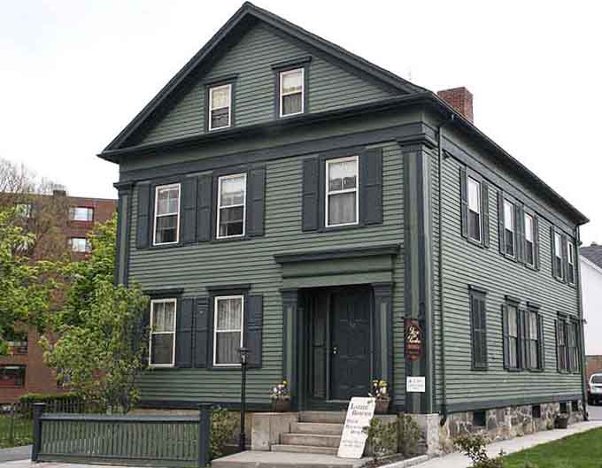 That unassuming green Victorian holds one of America's most chilling unsolved mysteries behind its shuttered windows.