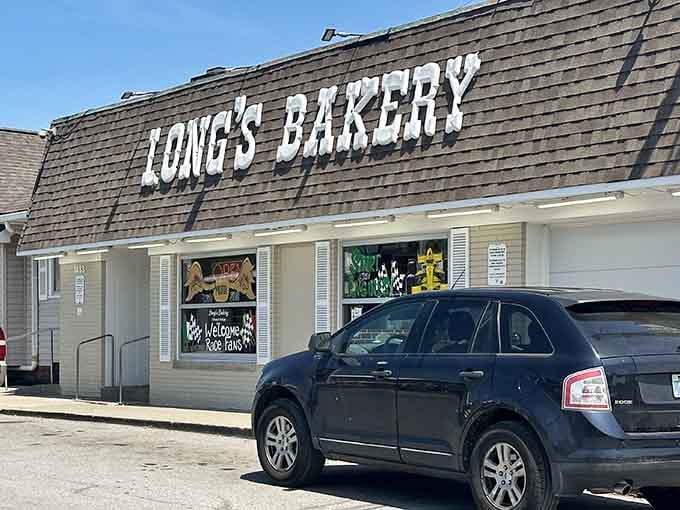 That classic roofline sign tells you everything: this is where generations have gathered for glazed perfection and morning joy.