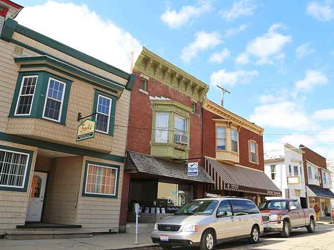 Classic storefronts with bay windows remind you that some towns never needed a makeover to be perfect.