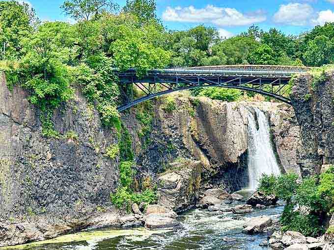 Nature's power on full display: this 77-foot waterfall crashes through ancient rock with the force of a thousand fire hoses.