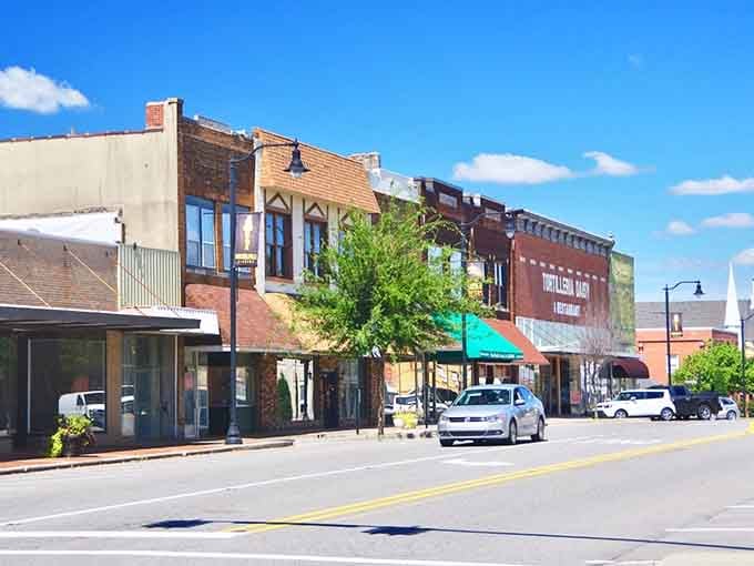 Classic brick storefronts line this charming main street where your dollar still means something real.