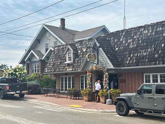 That charming brick and shingle architecture tells you everything: this is where serious steak lovers gather for unforgettable meals.