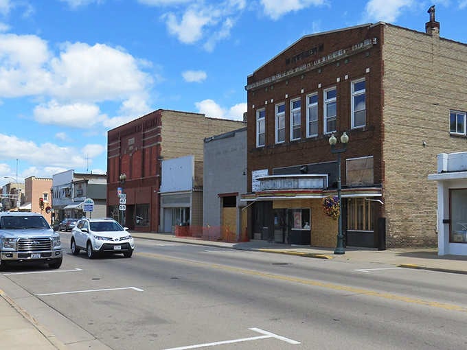 Classic brick storefronts line this peaceful main street where parking is plentiful and stress is optional.
