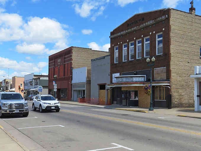 Classic brick storefronts line this peaceful Main Street where parking is plentiful and stress is optional.