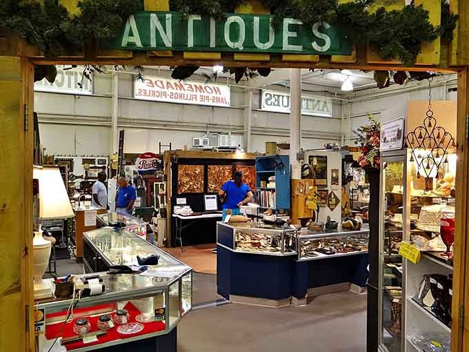 Glass cases filled with gleaming collectibles create a museum-like atmosphere where everything's actually for sale at bargain prices.