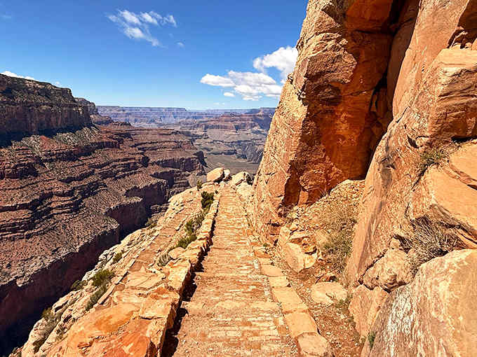 Standing on the edge of forever, where ancient stone steps lead to views that humble even the most jaded traveler.