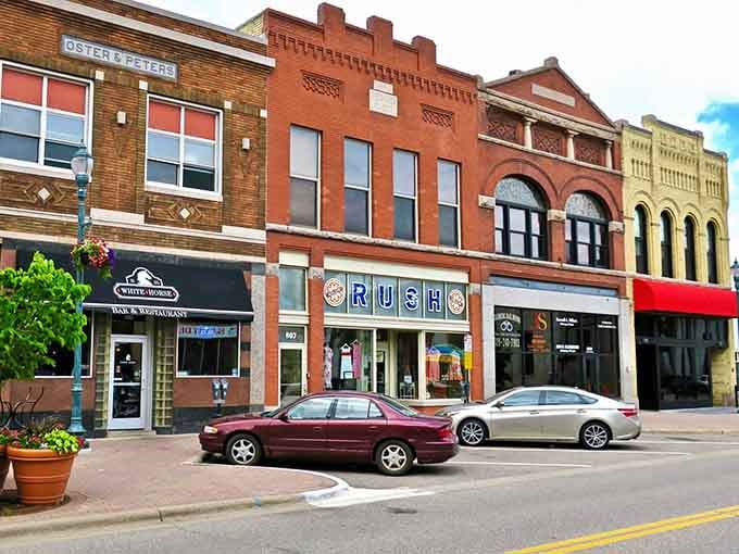 Classic brick storefronts line the street like old friends waiting to share stories over coffee and pie.