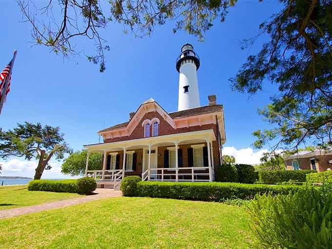 That charming keeper's cottage with its wraparound porch looks like the perfect spot for sweet tea and ocean breezes.