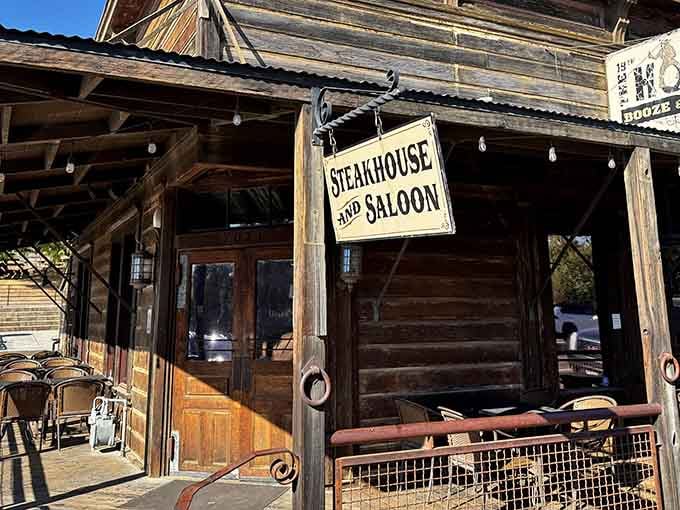 That weathered wood and swinging sign promise Old West hospitality with a perfectly grilled ribeye chaser.