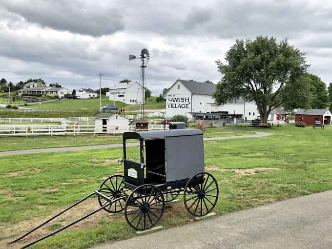 That buggy parked by the windmill is your first clue that life moves slower here, and honestly, that's refreshing.