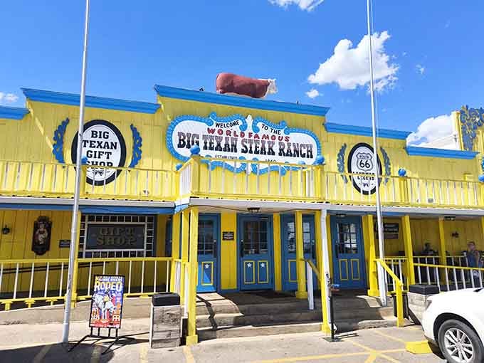That bright yellow building with a cow on the roof isn't subtle, and honestly, why should it be?