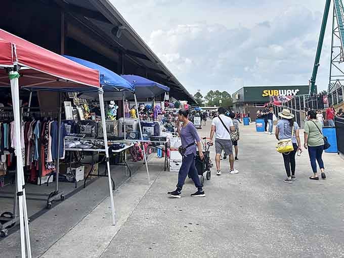 Colorful canopies stretch endlessly while shoppers stroll past treasures that make your garage sale finds look downright amateur.