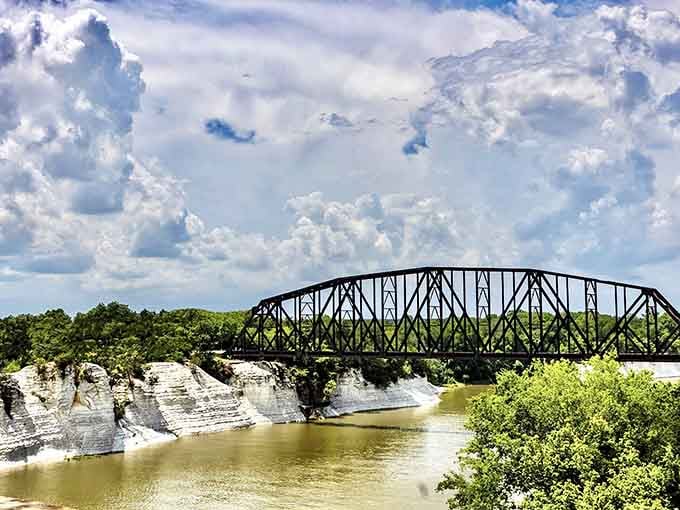 That historic bridge spanning these brilliant white chalk cliffs creates a scene straight out of the English countryside.